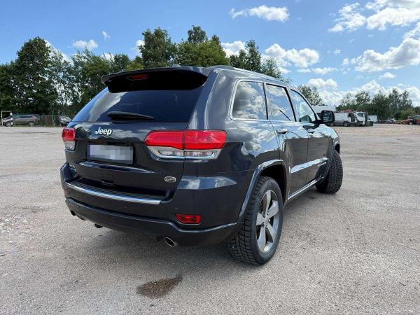 Grey Jeep Grand Cherokee 2015 in Vilnius, with an engine capacity of 2.99 L and mileage of 279 thousand km for 12990 €, photo 5 on AUTOMOTO.COM.LV