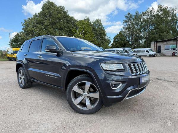Grey Jeep Grand Cherokee 2015 in Vilnius, with an engine capacity of 2.99 L and mileage of 279 thousand km for 12990 €, photo 7 on AUTOMOTO.COM.LV