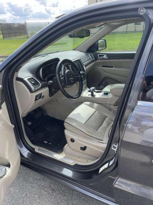 Pelēks Jeep Grand Cherokee 2015 Panevēža, ar dzinēja tilpumu 5.65 L un nobraukumu 307 tūkst. km par 12900 €, foto 6 vietnē AUTOMOTO.COM.LV