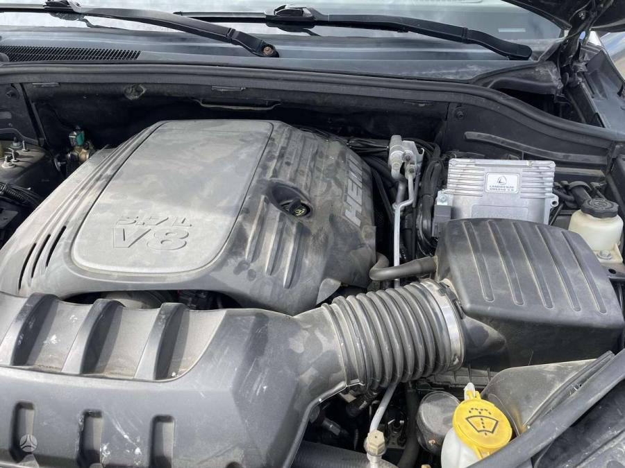 Pelēks Jeep Grand Cherokee 2015 Panevēža, ar dzinēja tilpumu 5.65 L un nobraukumu 307 tūkst. km par 12900 €, foto 11 vietnē AUTOMOTO.COM.LV