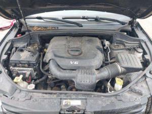 Grey Jeep Grand Cherokee 2015 in Siauliai, with an engine capacity of 3.60 L and mileage of 250 thousand km for 8400 €, photo 14 on AUTOMOTO.COM.LV