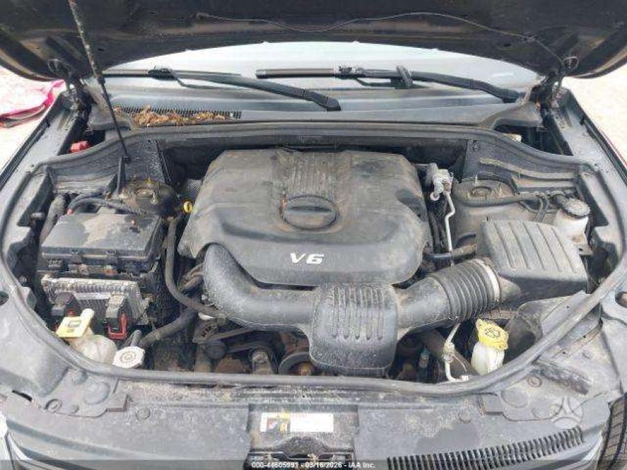 Grey Jeep Grand Cherokee 2015 in Siauliai, with an engine capacity of 3.60 L and mileage of 250 thousand km for 8400 €, photo 14 on AUTOMOTO.COM.LV
