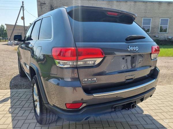 Grey Jeep Grand Cherokee 2015 in Siauliai, with an engine capacity of 2.99 L and mileage of 300 thousand km for 10900 €, photo 4 on AUTOMOTO.COM.LV