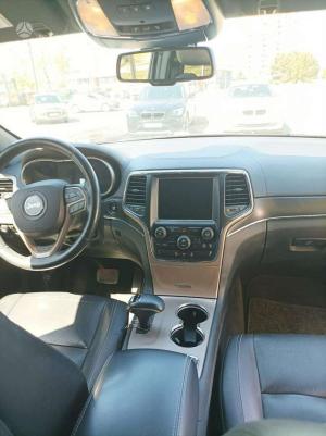 Pelēks Jeep Grand Cherokee 2015 Kauņa, ar dzinēja tilpumu 3.60 L un nobraukumu 191 tūkst. km par 14900 €, foto 7 vietnē AUTOMOTO.COM.LV