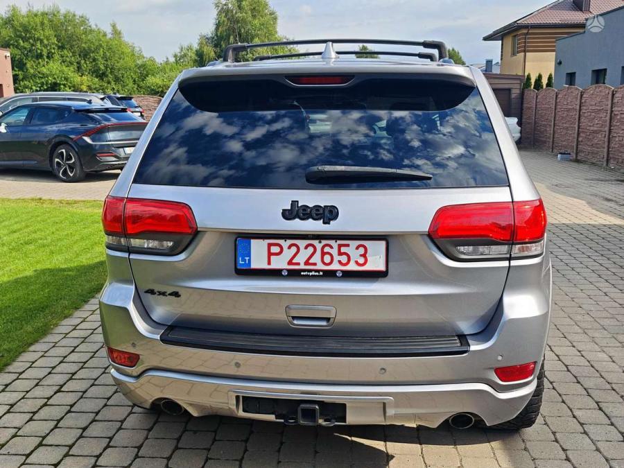 Grey Jeep Grand Cherokee 2015 in Kaunas, with an engine capacity of 3.60 L and mileage of 190 thousand km for 13700 €, photo 7 on AUTOMOTO.COM.LV