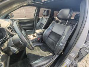 Grey Jeep Grand Cherokee 2015 in Kaunas, with an engine capacity of 3.60 L and mileage of 190 thousand km for 13700 €, photo 14 on AUTOMOTO.COM.LV