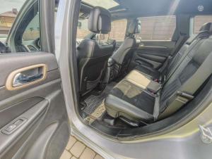 Grey Jeep Grand Cherokee 2015 in Kaunas, with an engine capacity of 3.60 L and mileage of 190 thousand km for 13700 €, photo 15 on AUTOMOTO.COM.LV