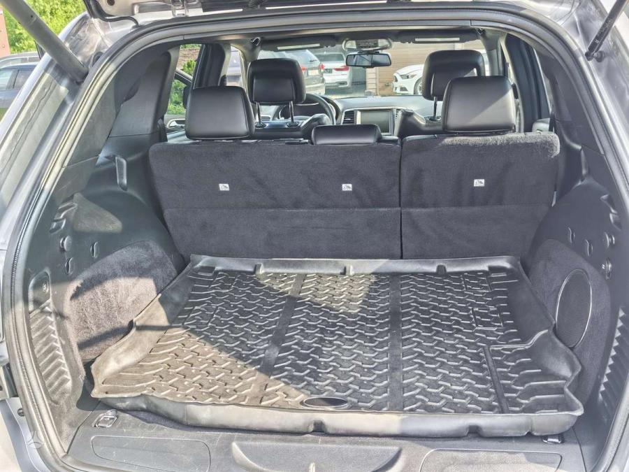 Grey Jeep Grand Cherokee 2015 in Kaunas, with an engine capacity of 3.60 L and mileage of 190 thousand km for 13700 €, photo 18 on AUTOMOTO.COM.LV