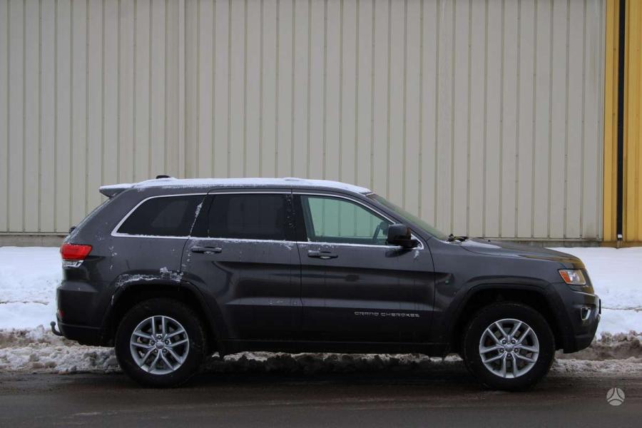 Grey Jeep Grand Cherokee 2016 in Vilnius, with an engine capacity of 3.60 L and mileage of 281 thousand km for 12999 €, photo 8 on AUTOMOTO.COM.LV