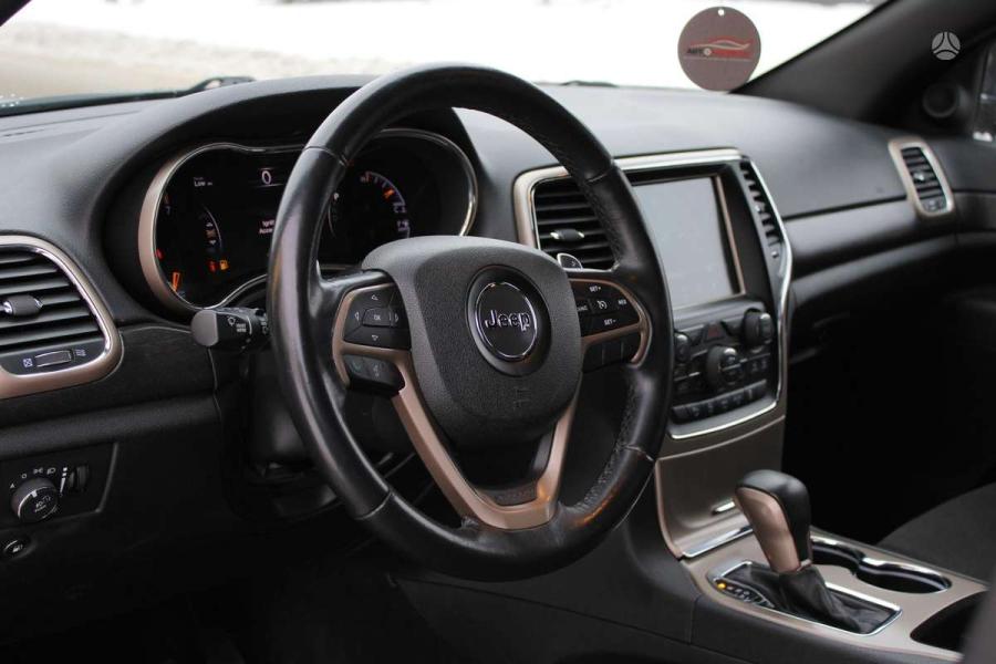 Grey Jeep Grand Cherokee 2016 in Vilnius, with an engine capacity of 3.60 L and mileage of 281 thousand km for 12999 €, photo 16 on AUTOMOTO.COM.LV
