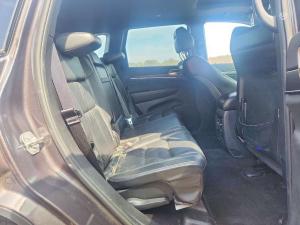 Grey Jeep Grand Cherokee 2016 in Siauliai, with an engine capacity of 5.65 L and mileage of 176 thousand km for 8500 €, photo 12 on AUTOMOTO.COM.LV