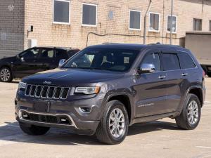 Pelēks Jeep Grand Cherokee 2016 Šauļi, ar dzinēja tilpumu 5.65 L un nobraukumu 235 tūkst. km par 11400 €, foto  vietnē AUTOMOTO.COM.LV