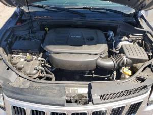 Grey Jeep Grand Cherokee 2016 in Siauliai, with an engine capacity of 3.60 L and mileage of 209 thousand km for 8900 €, photo 13 on AUTOMOTO.COM.LV