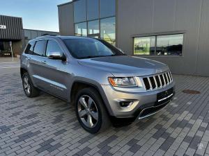 Pelēks Jeep Grand Cherokee 2016 Šauļi, ar dzinēja tilpumu 3.60 L un nobraukumu 213 tūkst. km par 12900 €, foto  vietnē AUTOMOTO.COM.LV