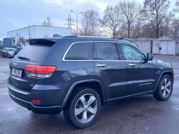 Grey Jeep Grand Cherokee 2017 in Siauliai, with an engine capacity of 3.00 L and mileage of 181 thousand km for 9950 €, photo 4 on AUTOMOTO.COM.LV