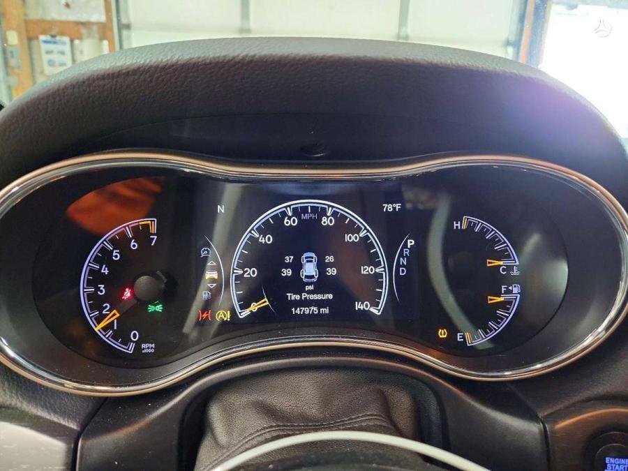 Grey Jeep Grand Cherokee 2017 in Siauliai, with an engine capacity of 3.60 L and mileage of 238 thousand km for 10500 €, photo 10 on AUTOMOTO.COM.LV