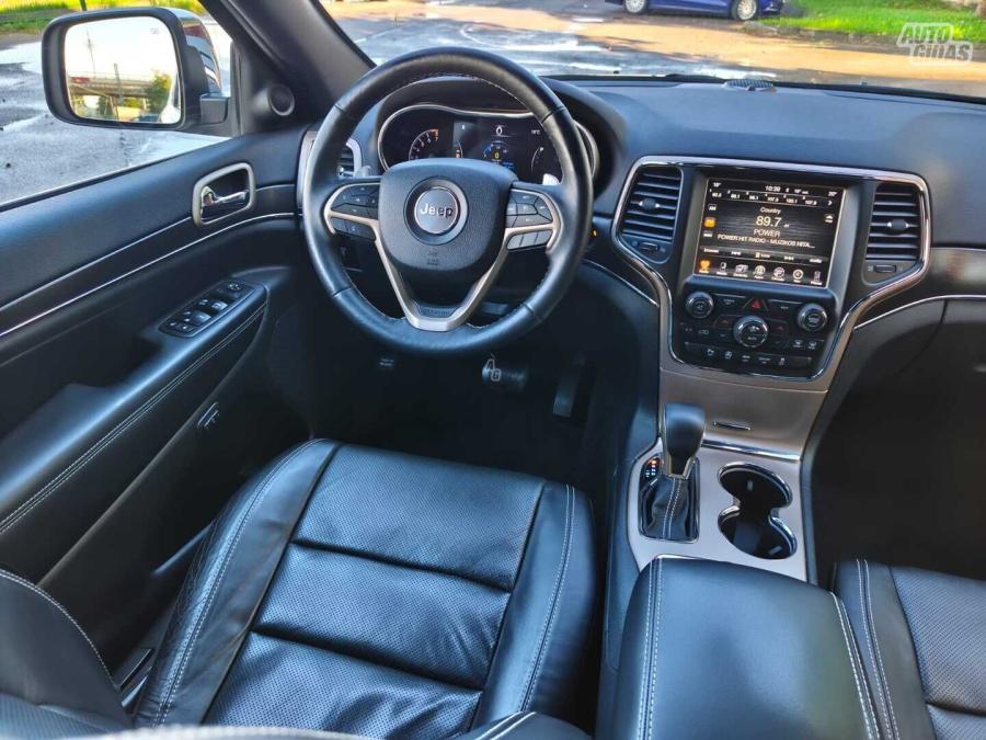 Grey Jeep Grand Cherokee 2017 in Siauliai, with an engine capacity of 3.60 L and mileage of 170 thousand km for 15400 €, photo 11 on AUTOMOTO.COM.LV