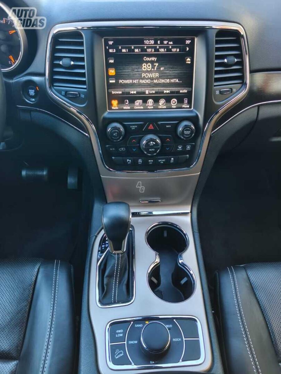 Grey Jeep Grand Cherokee 2017 in Siauliai, with an engine capacity of 3.60 L and mileage of 170 thousand km for 15400 €, photo 17 on AUTOMOTO.COM.LV