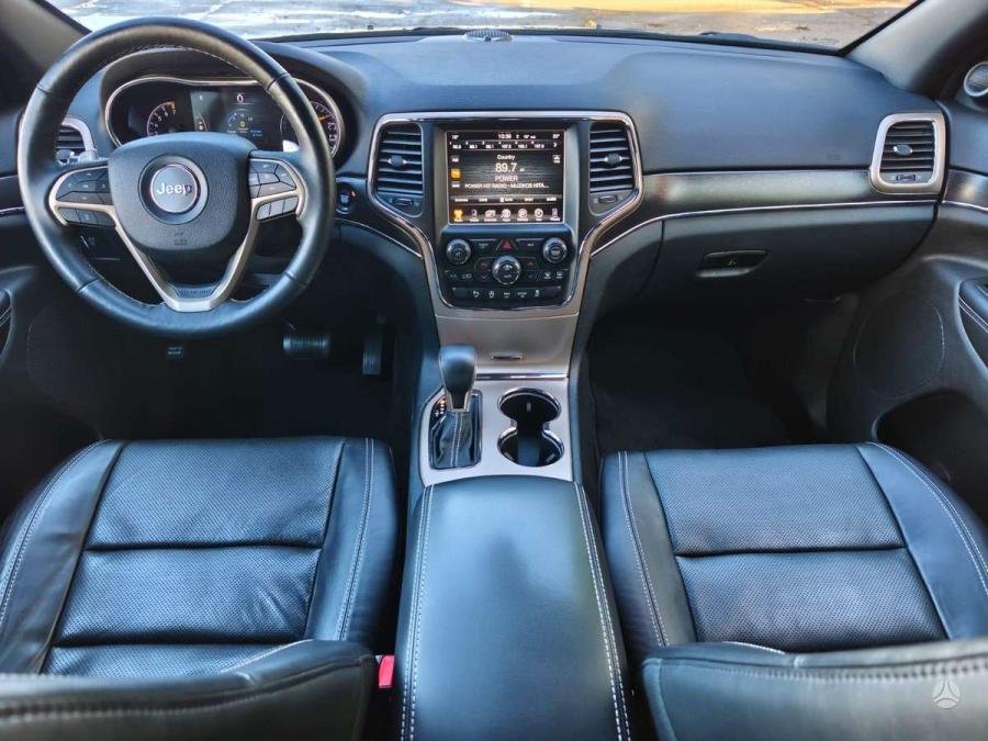 Grey Jeep Grand Cherokee 2017 in Siauliai, with an engine capacity of 3.60 L and mileage of 170 thousand km for 15400 €, photo 12 on AUTOMOTO.COM.LV