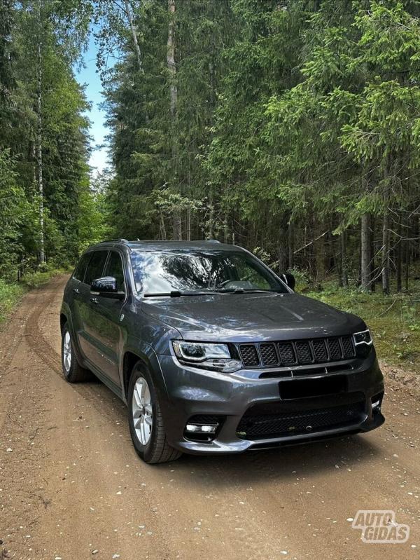 Jeep Grand Cherokee 2017 Kauņa vietnē Pelēks Jeep Grand Cherokee 2017 Kauņa, ar dzinēja tilpumu 5.70 L un nobraukumu 199 tūkst. km par 18000 €, foto 4 vietnē AUTOMOTO.COM.LV