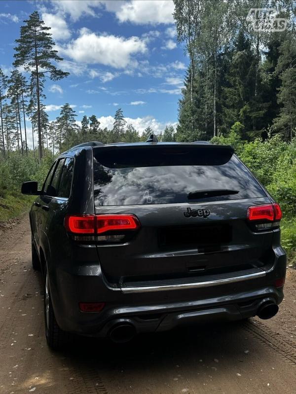 Jeep Grand Cherokee 2017 Kauņa vietnē Pelēks Jeep Grand Cherokee 2017 Kauņa, ar dzinēja tilpumu 5.70 L un nobraukumu 199 tūkst. km par 18000 €, foto 8 vietnē AUTOMOTO.COM.LV