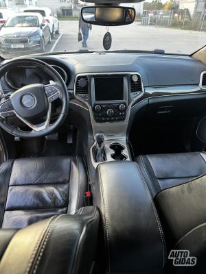 Grey Jeep Grand Cherokee 2017 in Kaunas, with an engine capacity of 5.70 L and mileage of 199 thousand km for 18000 €, photo 14 on AUTOMOTO.COM.LV