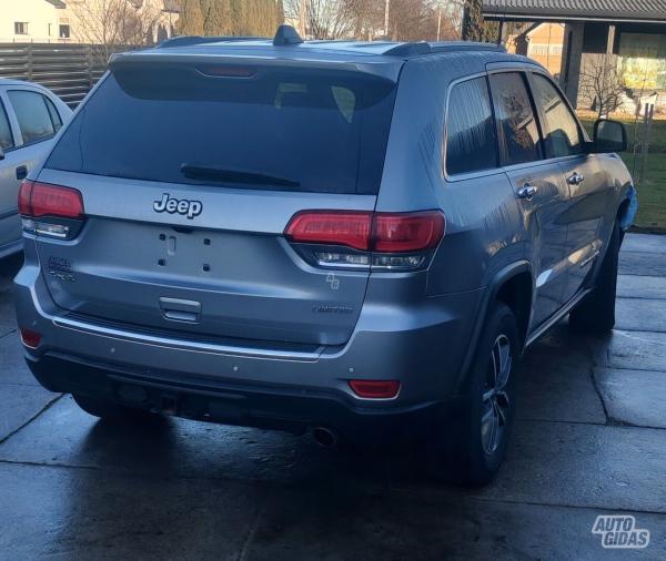 Grey Jeep Grand Cherokee 2019 in Siauliai, with an engine capacity of 3.60 L and mileage of 190 thousand km for 13800 €, photo 4 on AUTOMOTO.COM.LV