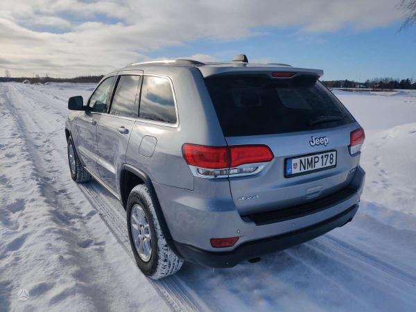Grey Jeep Grand Cherokee 2019 in Vilnius, with an engine capacity of 3.60 L and mileage of 128 thousand km for 17000 €, photo 5 on AUTOMOTO.COM.LV