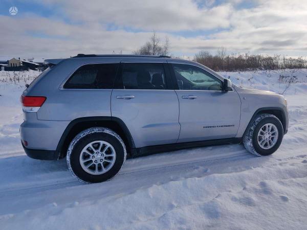 Grey Jeep Grand Cherokee 2019 in Vilnius, with an engine capacity of 3.60 L and mileage of 128 thousand km for 17000 €, photo 9 on AUTOMOTO.COM.LV