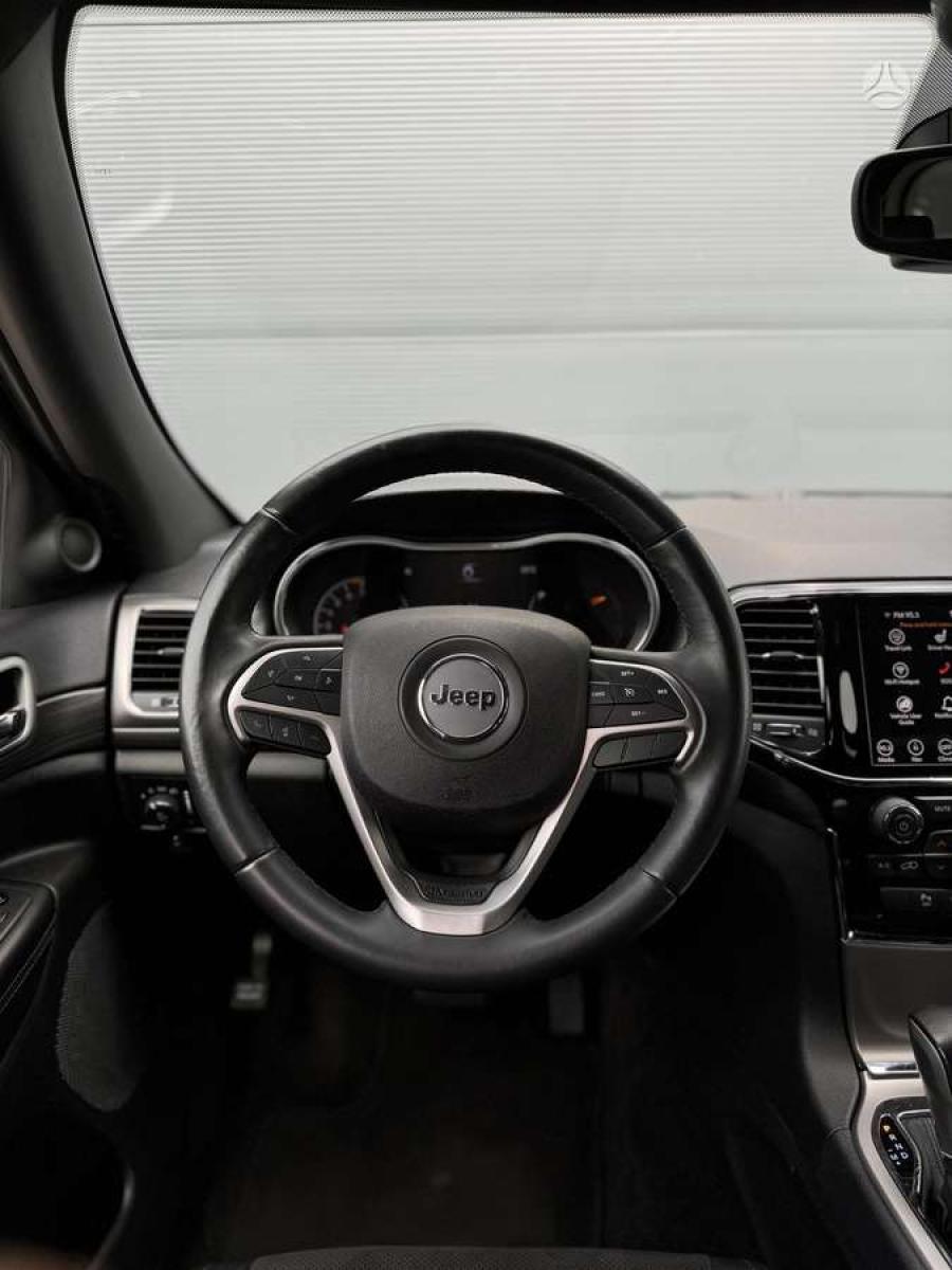 Grey Jeep Grand Cherokee 2019 in Klaipeda, with an engine capacity of 3.60 L and mileage of 140 thousand km for 15700 €, photo 31 on AUTOMOTO.COM.LV