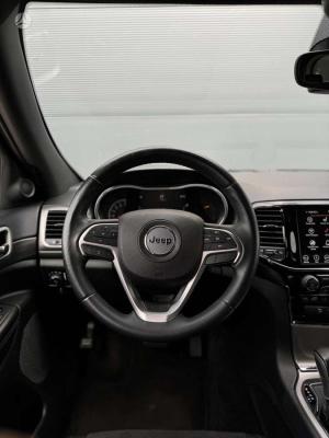 Grey Jeep Grand Cherokee 2019 in Klaipeda, with an engine capacity of 3.60 L and mileage of 140 thousand km for 15200 €, photo 28 on AUTOMOTO.COM.LV