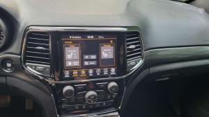 Grey Jeep Grand Cherokee 2020 in Vilnius, with an engine capacity of 3.60 L and mileage of 112 thousand km for 20699 €, photo 14 on AUTOMOTO.COM.LV