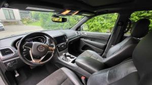 Grey Jeep Grand Cherokee 2020 in Vilnius, with an engine capacity of 3.60 L and mileage of 112 thousand km for 20699 €, photo 16 on AUTOMOTO.COM.LV