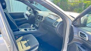 Grey Jeep Grand Cherokee 2021 in Ukmerge, with an engine capacity of 3.60 L and mileage of 43 thousand km for 11999 €, photo 13 on AUTOMOTO.COM.LV