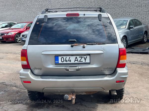 Grey Jeep Grand Cherokee 2000 in Narva, with an engine capacity of 3.10 L and mileage of 0 thousand km for 999 €, photo 2 on AUTOMOTO.COM.LV