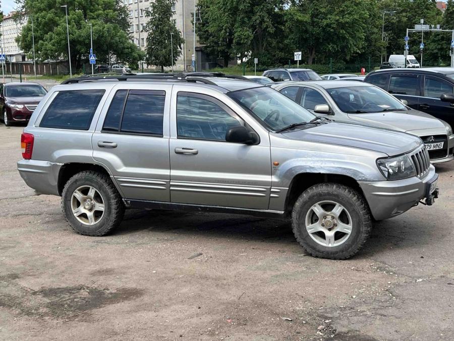 Pelēks Jeep Grand Cherokee 2000 Narva, ar dzinēja tilpumu 3.10 L un nobraukumu 308 tūkst. km par 999 €, foto 13 vietnē AUTOMOTO.COM.LV