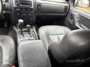 Pelēks Jeep Grand Cherokee 2002 Elva, ar dzinēja tilpumu 2.70 L un nobraukumu 390 tūkst. km par 4575 €, foto 6 vietnē AUTOMOTO.COM.LV