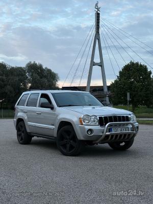 Pelēks Jeep Grand Cherokee 2007 Tartu, ar dzinēja tilpumu 5.70 L un nobraukumu 230 tūkst. km par 3900 €, foto  vietnē AUTOMOTO.COM.LV