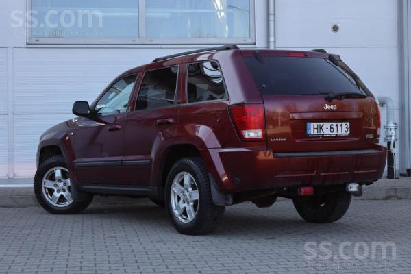 Red Jeep Grand Cherokee 2007 in Riga, with an engine capacity of 4.70 L and mileage of 0 thousand km for 3995 €, photo 3 on AUTOMOTO.COM.LV