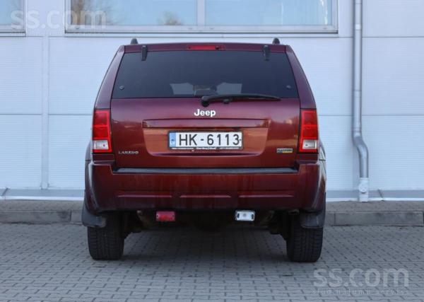 Red Jeep Grand Cherokee 2007 in Riga, with an engine capacity of 4.70 L and mileage of 0 thousand km for 3995 €, photo 4 on AUTOMOTO.COM.LV