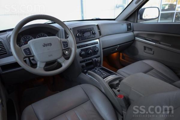 Red Jeep Grand Cherokee 2007 in Riga, with an engine capacity of 4.70 L and mileage of 0 thousand km for 3995 €, photo 8 on AUTOMOTO.COM.LV