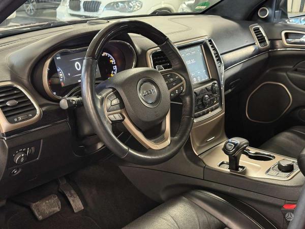 Sarkans Jeep Grand Cherokee 2014 Marijampole, ar dzinēja tilpumu 2.99 L un nobraukumu 197 tūkst. km par 15350 €, foto 10 vietnē AUTOMOTO.COM.LV