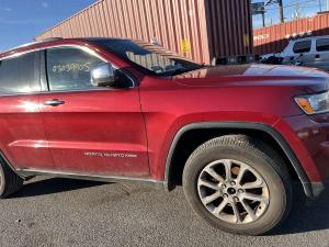 Red Jeep Grand Cherokee 2014 in Siauliai, with an engine capacity of 3.60 L and mileage of 247 thousand km for 6250 €, photo 8 on AUTOMOTO.COM.LV