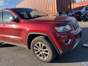 Red Jeep Grand Cherokee 2014 in Siauliai, with an engine capacity of 3.60 L and mileage of 247 thousand km for 6250 €, photo 11 on AUTOMOTO.COM.LV