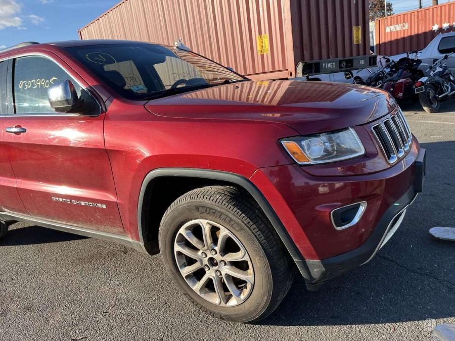Red Jeep Grand Cherokee 2014 in Siauliai, with an engine capacity of 3.60 L and mileage of 247 thousand km for 6250 €, photo 11 on AUTOMOTO.COM.LV