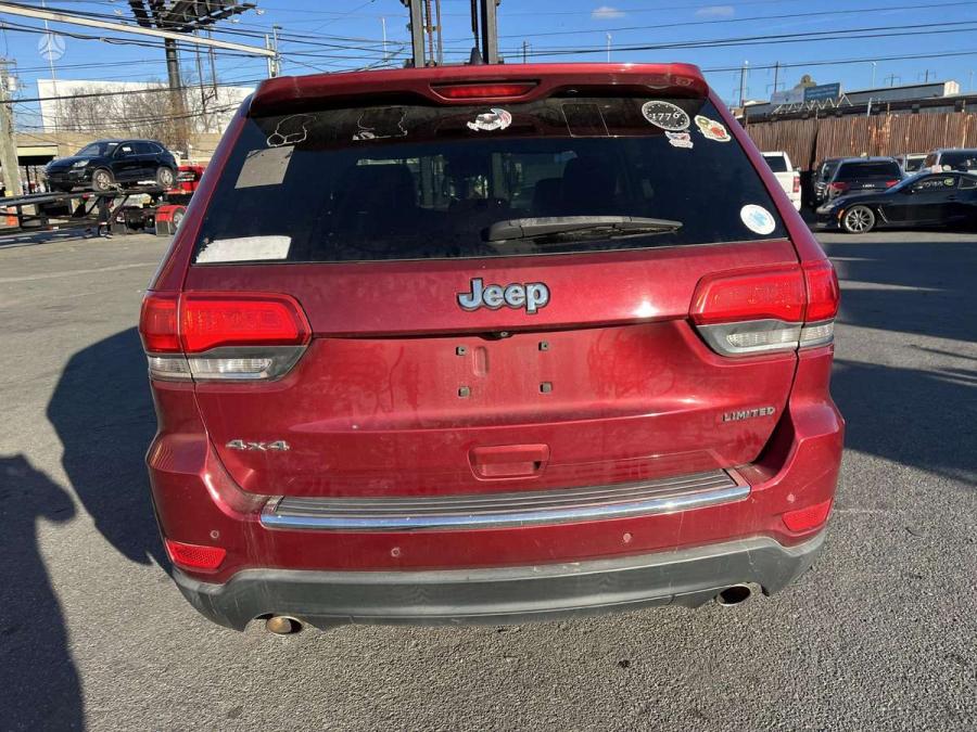 Red Jeep Grand Cherokee 2014 in Siauliai, with an engine capacity of 3.60 L and mileage of 247 thousand km for 6250 €, photo 12 on AUTOMOTO.COM.LV
