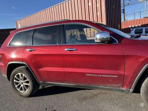 Red Jeep Grand Cherokee 2014 in Siauliai, with an engine capacity of 3.60 L and mileage of 247 thousand km for 6250 €, photo 18 on AUTOMOTO.COM.LV