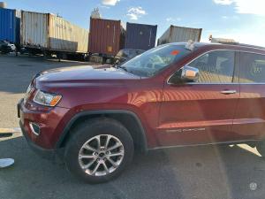 Red Jeep Grand Cherokee 2014 in Siauliai, with an engine capacity of 3.60 L and mileage of 247 thousand km for 6250 €, photo 19 on AUTOMOTO.COM.LV