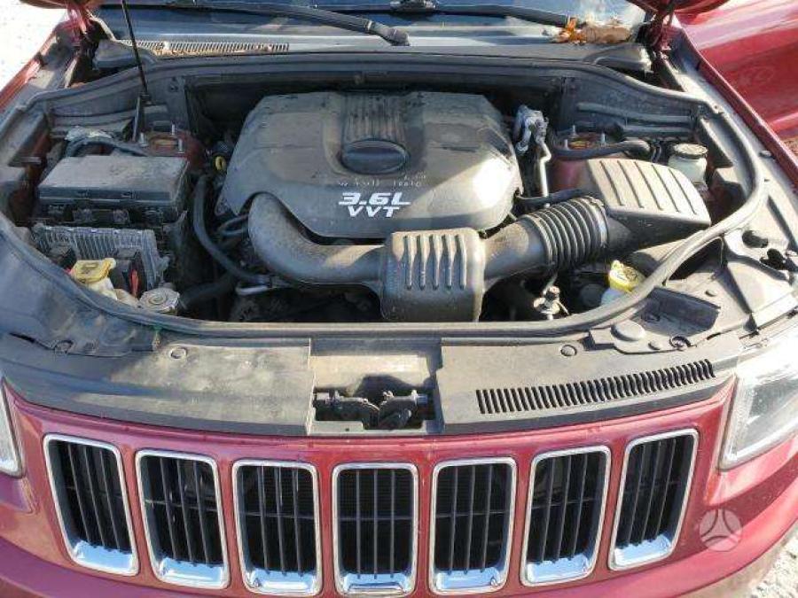 Red Jeep Grand Cherokee 2014 in Siauliai, with an engine capacity of 3.60 L and mileage of 247 thousand km for 6250 €, photo 27 on AUTOMOTO.COM.LV
