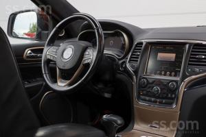 Red Jeep Grand Cherokee 2014 in Riga, with an engine capacity of 3.00 L and mileage of 0 thousand km for 11995 €, photo 24 on AUTOMOTO.COM.LV